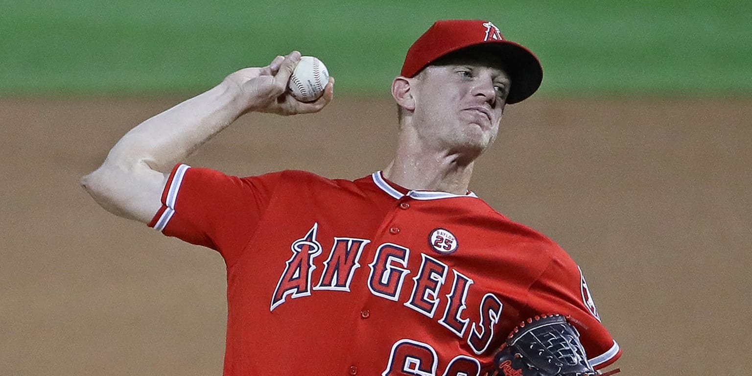 Angels hanging on to playoff hopes after win