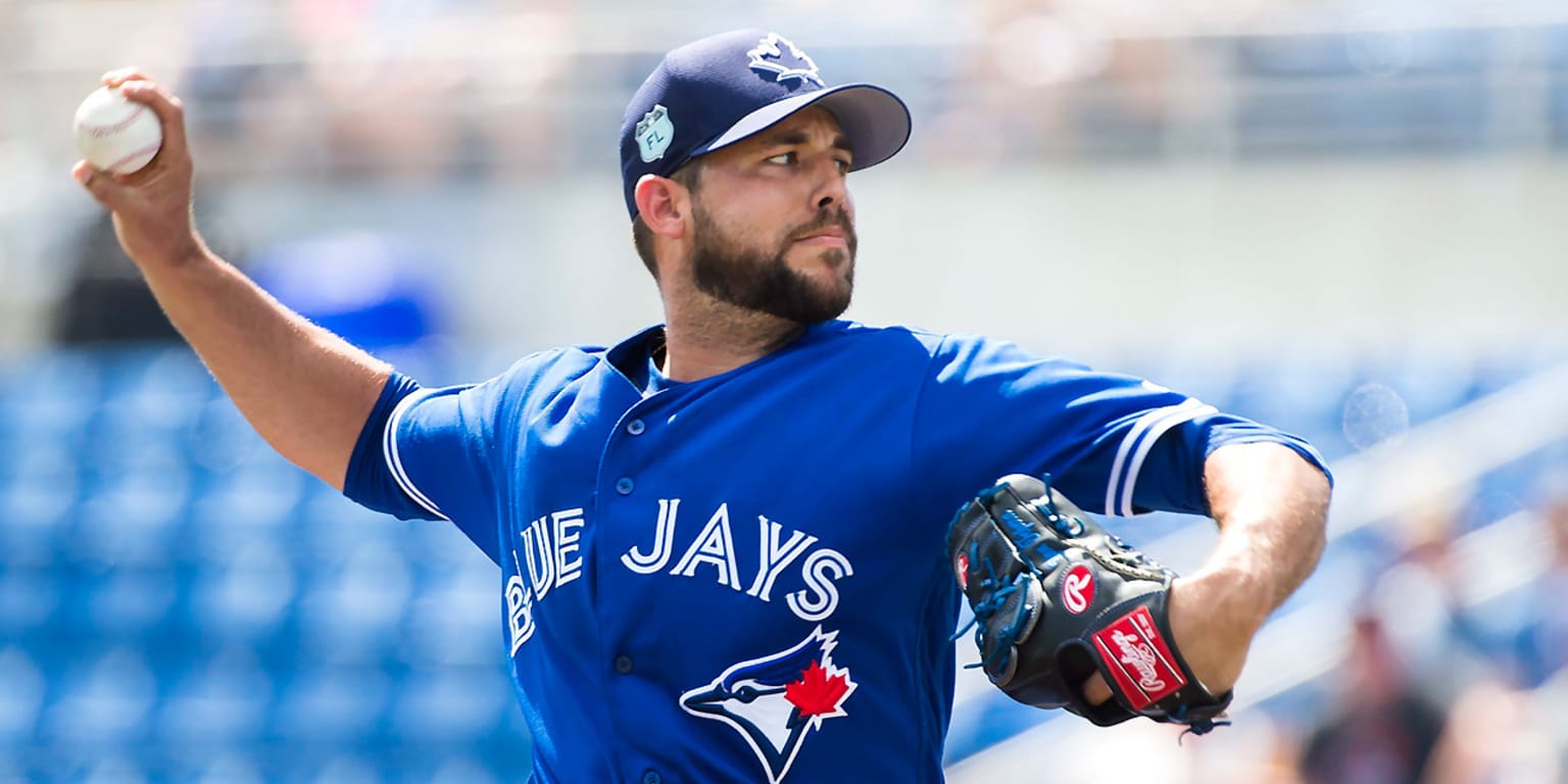 Blue Jays Ryan Tepera throws to Russell Martin