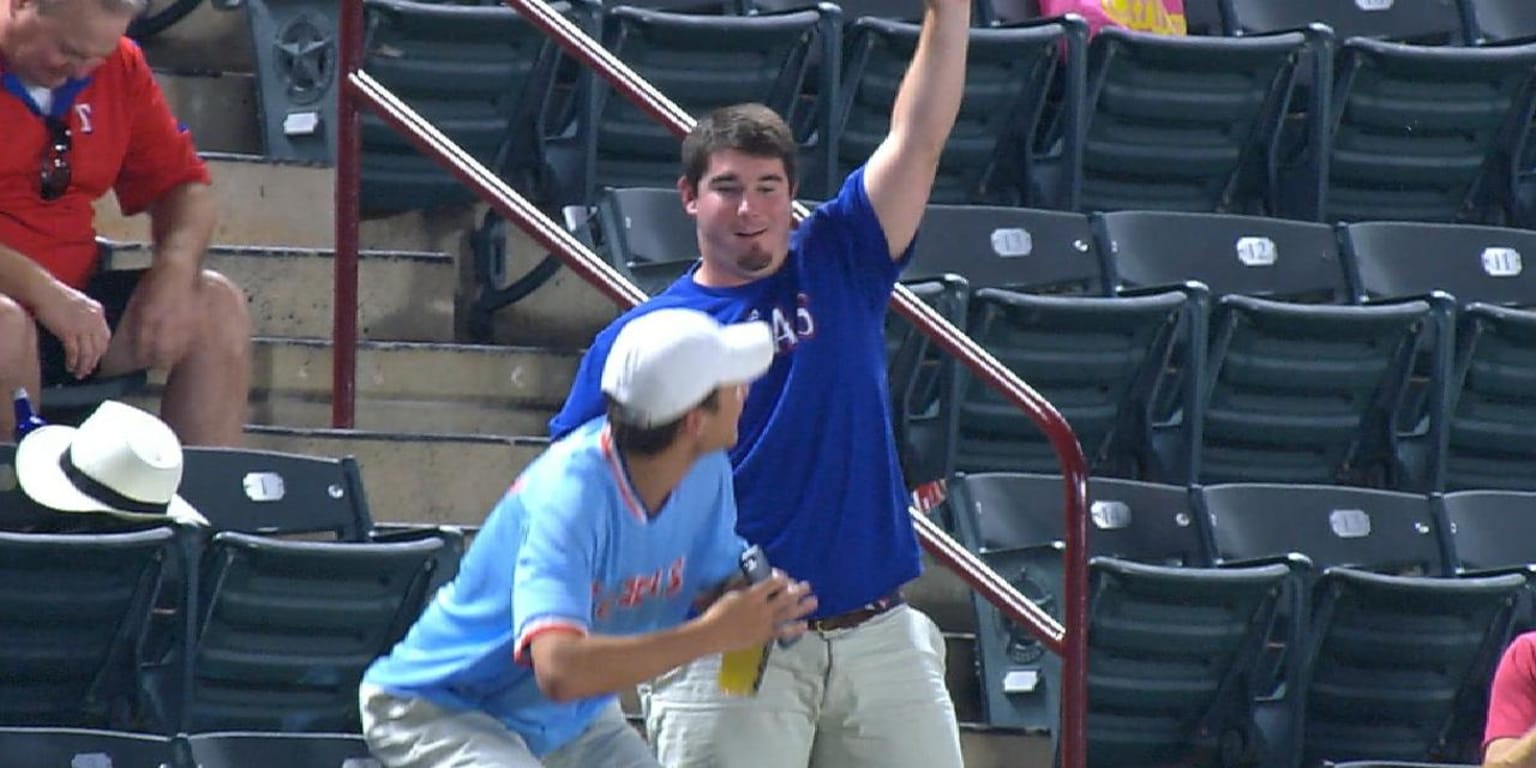 Watch this Rangers fan make a barehanded grab look easy | MLB.com