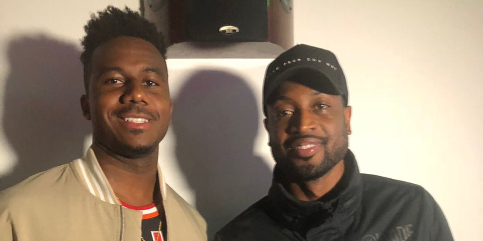 Lewis Brinson delivered a new Marlins jersey to Dwyane Wade | MLB.com