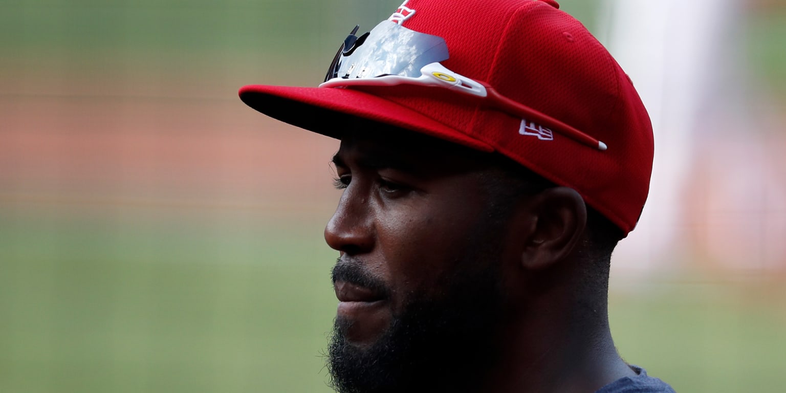 Dexter Fowler sits to protest racial injustice