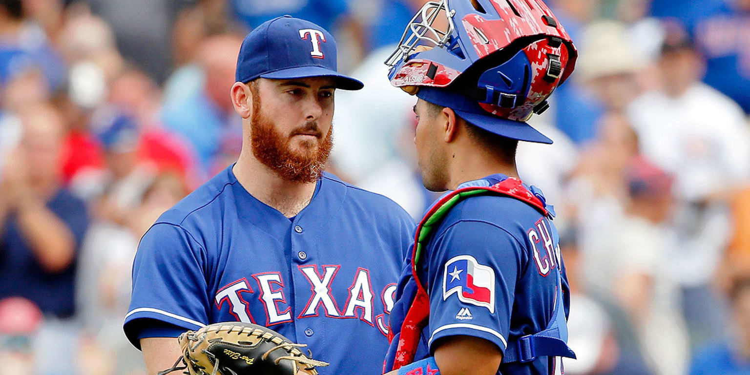 Rangers' Sam Dyson strikes out side for save
