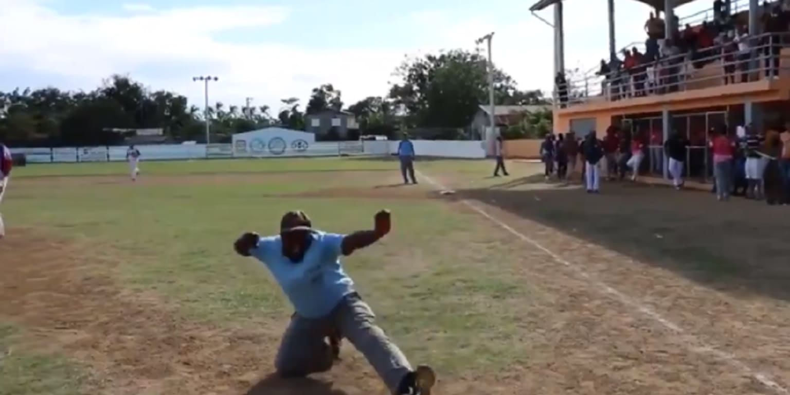 You simply have to watch this umpire's outrageous, basketball-inspired ...
