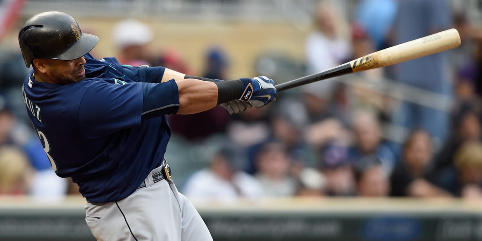 Cruz slugs 2 HRs, leaves with sore left wrist