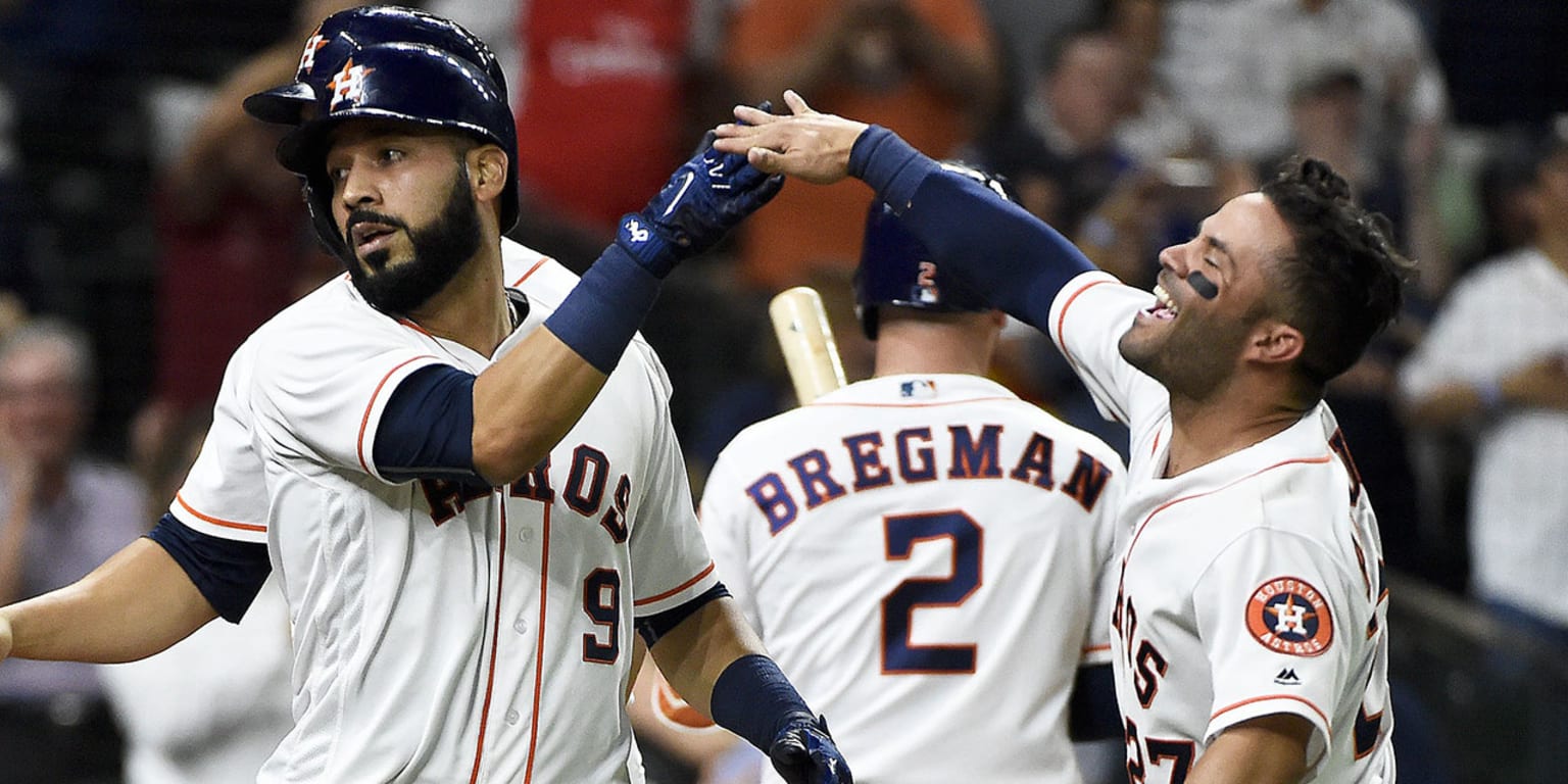 Astros rally with grand slam, defeat Rangers