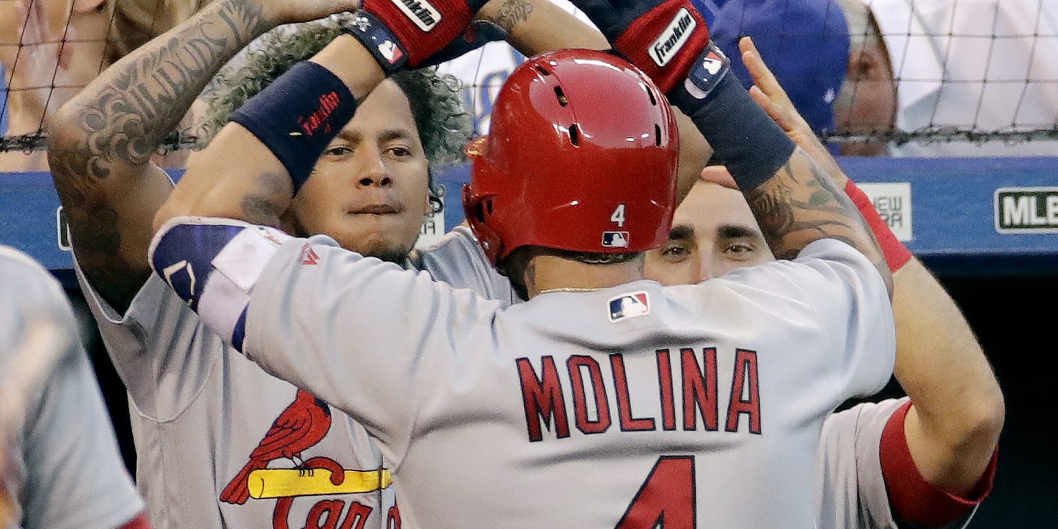 Cards ride six-run fifth inning to rout Royals