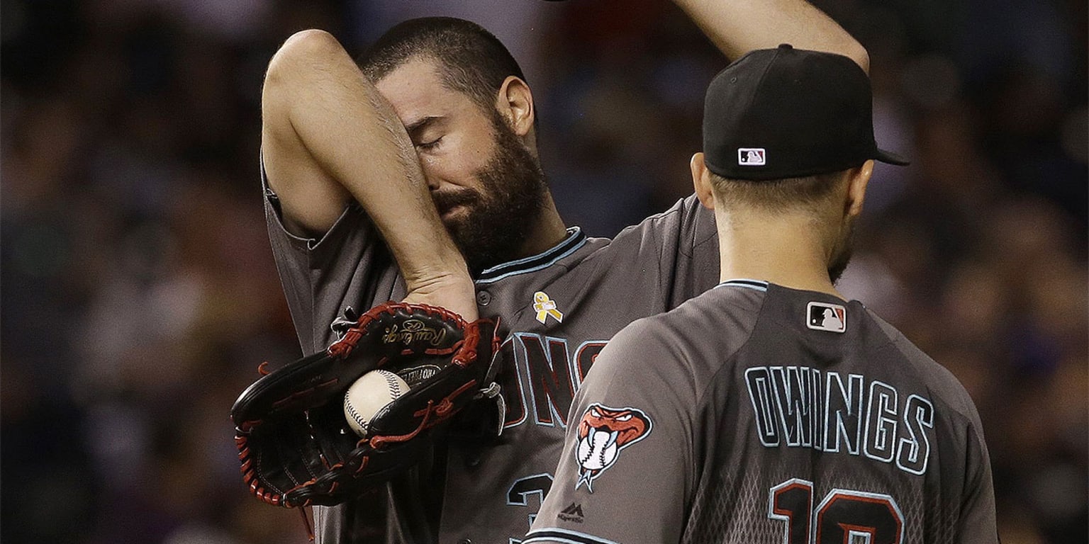 Diamondbacks hit by Rockies' two big innings