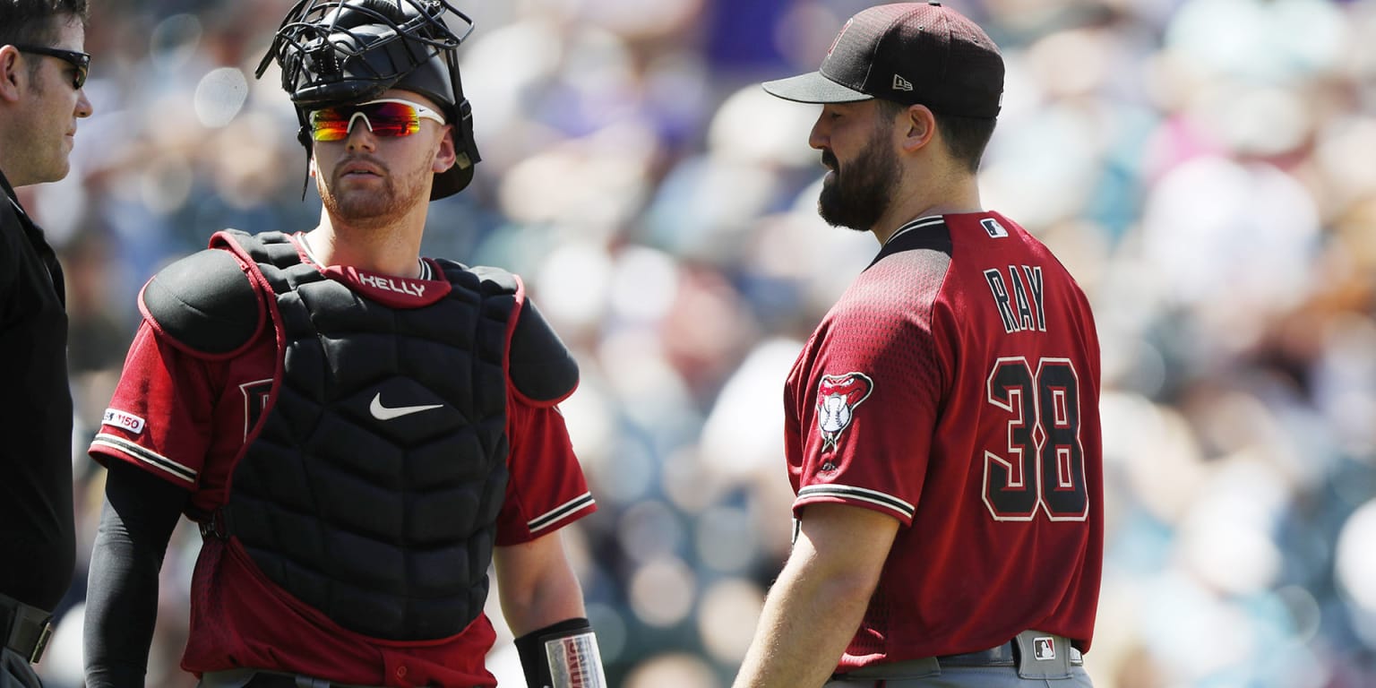 D-backs lose game late, Ray exits early
