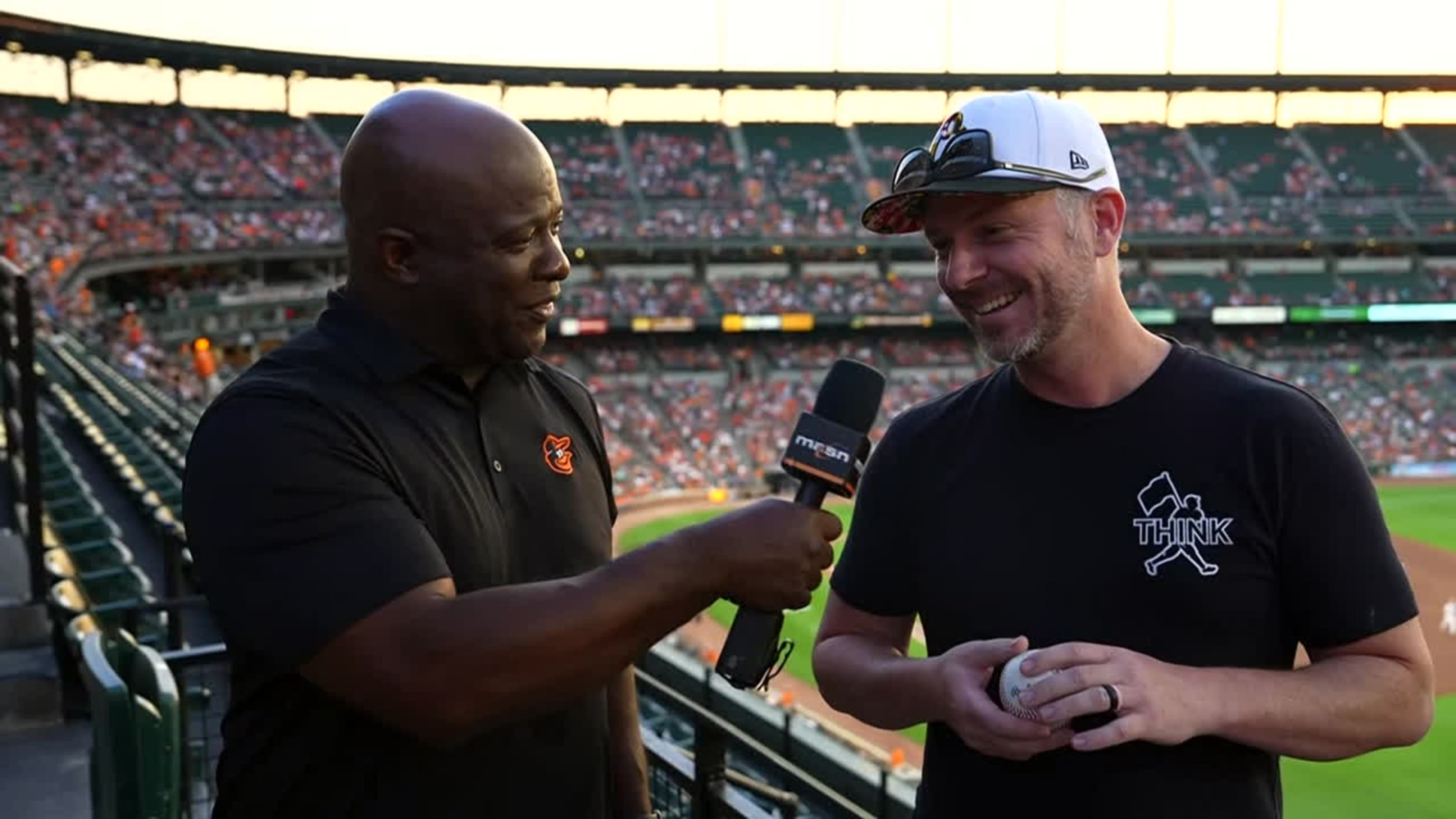 man catching baseball