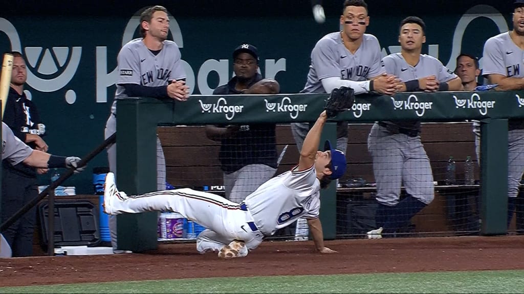baseball players playing catch