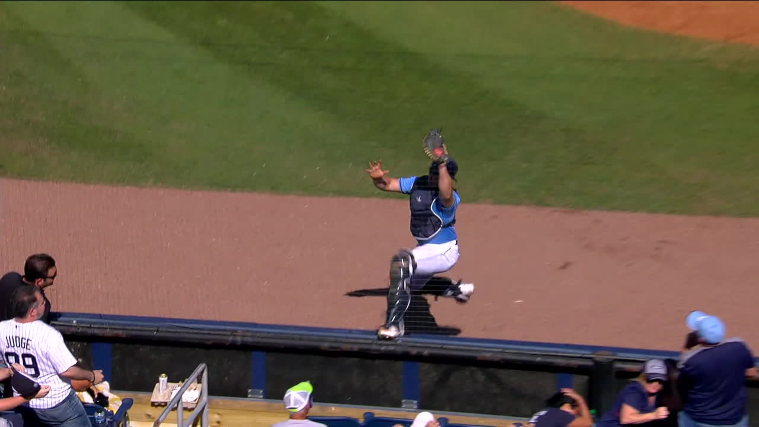 Logan Driscoll makes a stellar catch near the netting