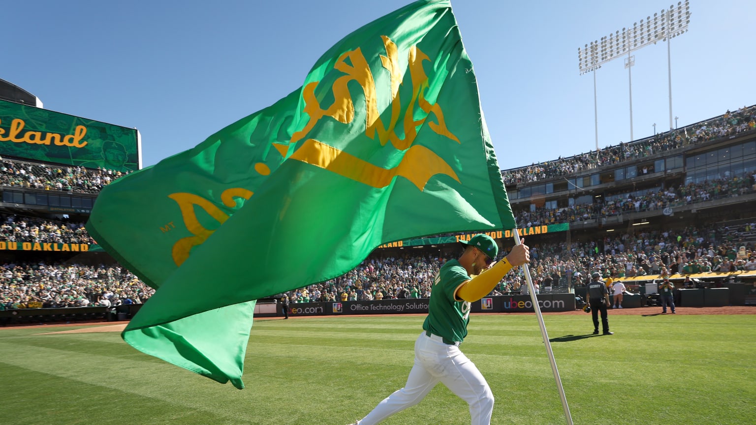 Max Schuemann waves A's flag around Oakland Coliseum | 09/26/2024 ...