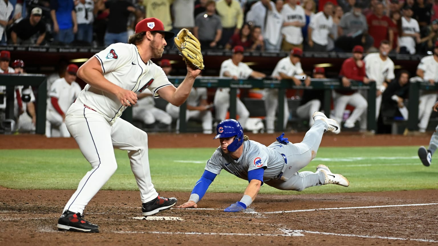 Nico Hoerner scores from second on a wild pitch | 04/15/2024 | MLB.com