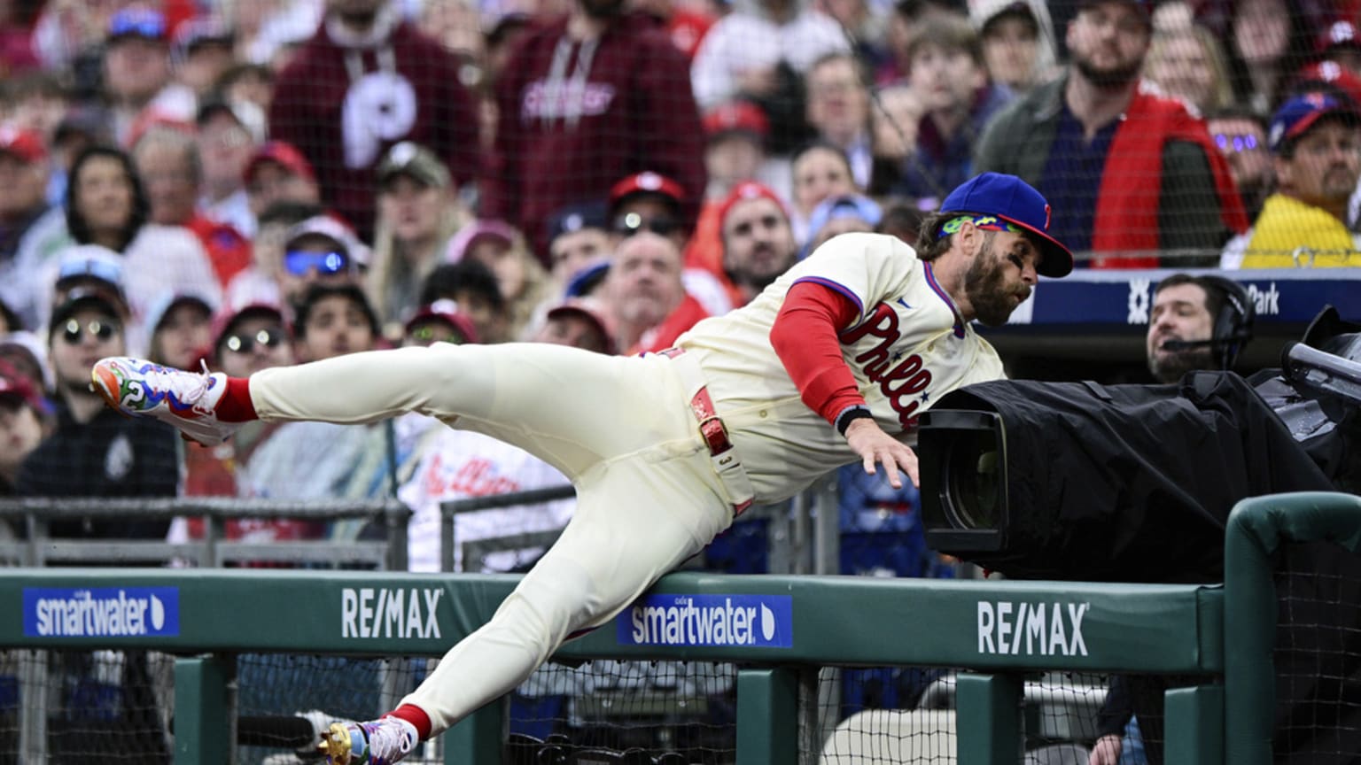 Bryce Harper tumbles over railing, stays in game | 03/30/2024 ...