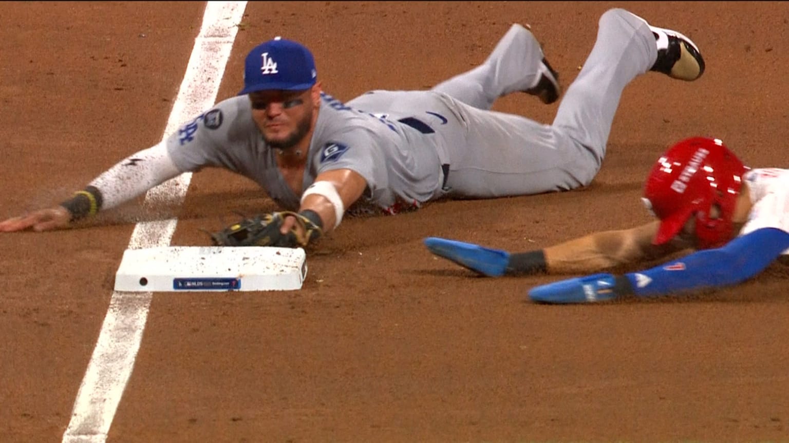 Miguel Rojas dives to the bag to escape trouble | 10/06/2025 | MLB.com