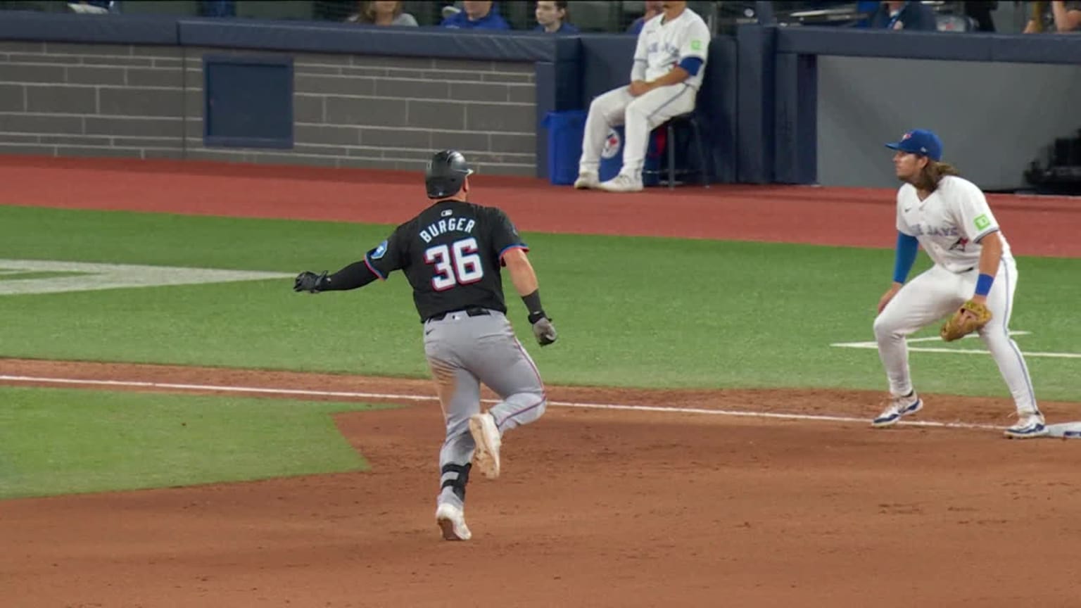 Jake Burger plates a run, out at third after review | 09/27/2024 ...
