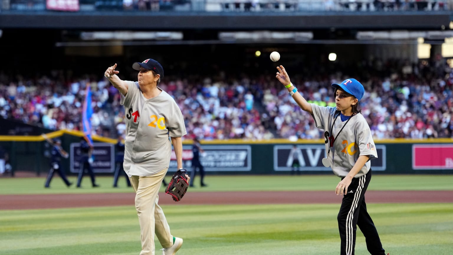 Amy Gibbons, Maddox Carmean throw out first pitches | 10/31/2023 ...