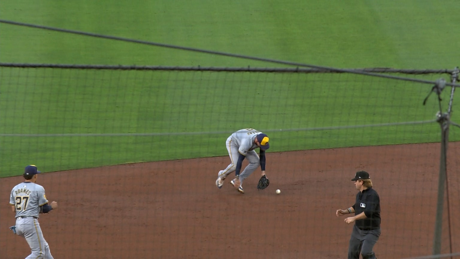 Jake Cronenworth reaches first base on a ground ball in the infield ...