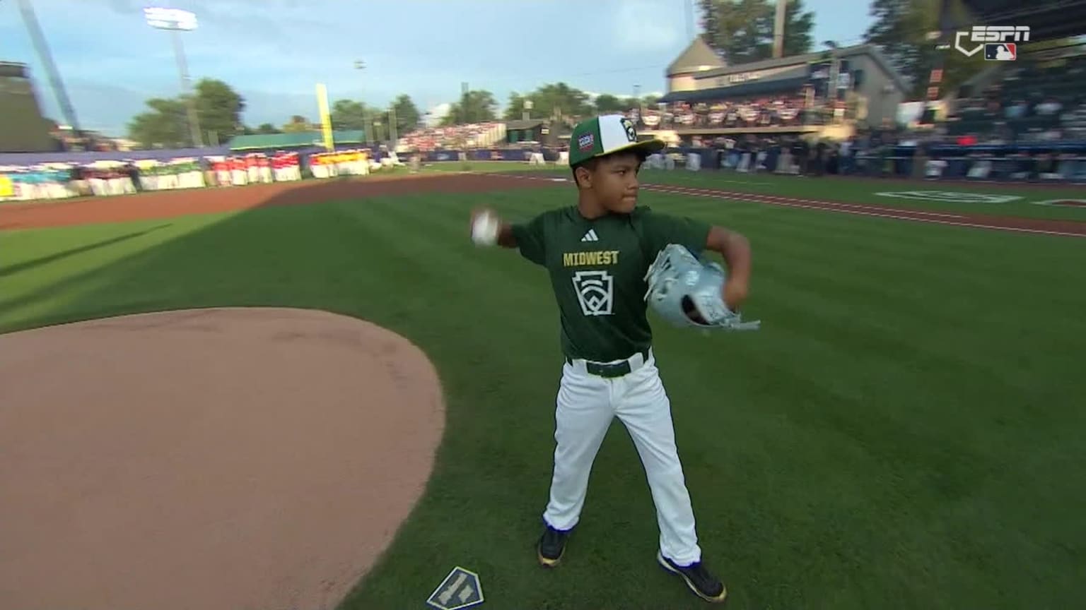 Little League players team up to throw first pitch | 08/18/2024 | New ...