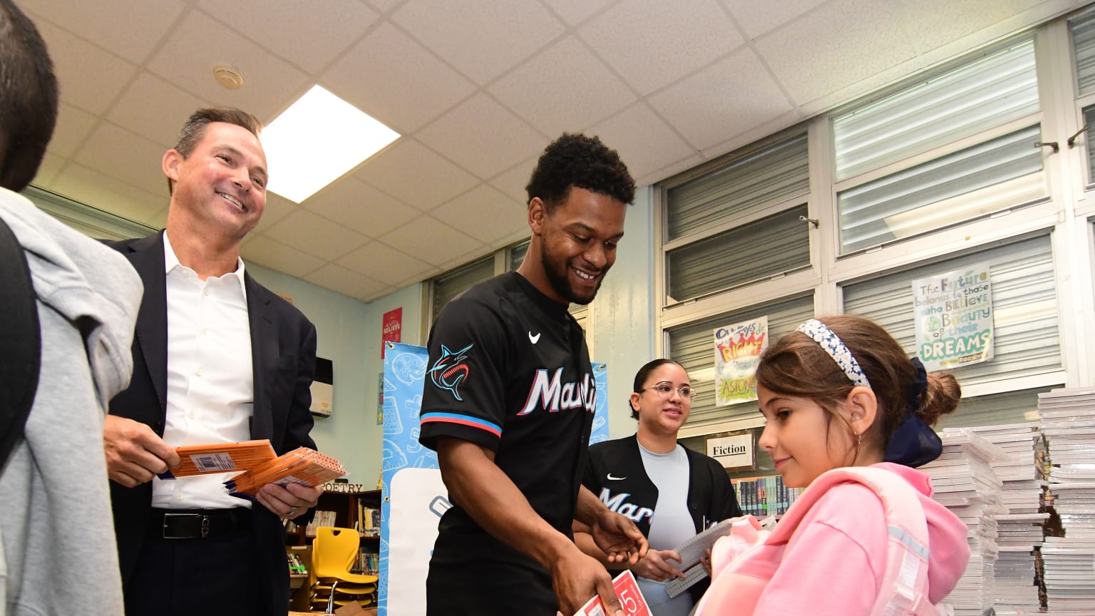 Marlins give back ahead of new school year