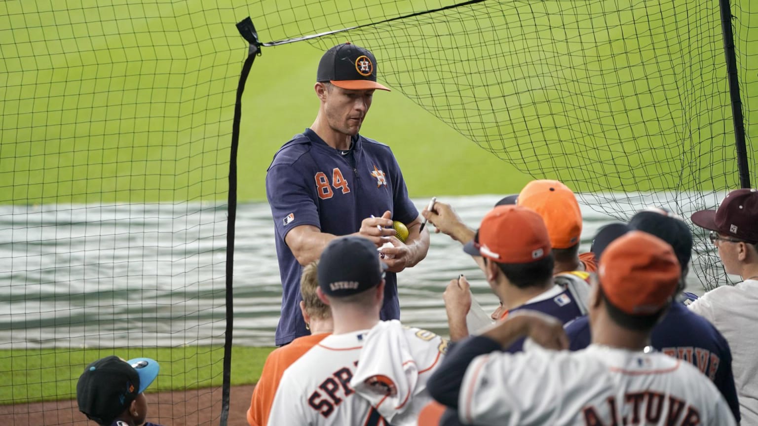 Astros coach Michael Collins coaching first base for Team Australia