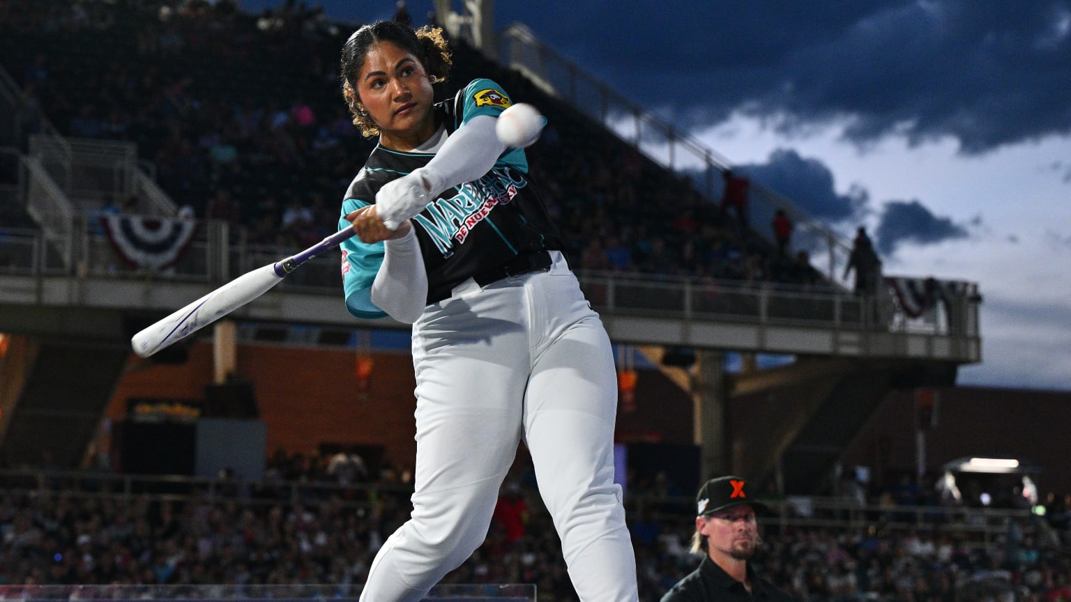 Jocelyn Alo isn't shy about holding the all-time home run record