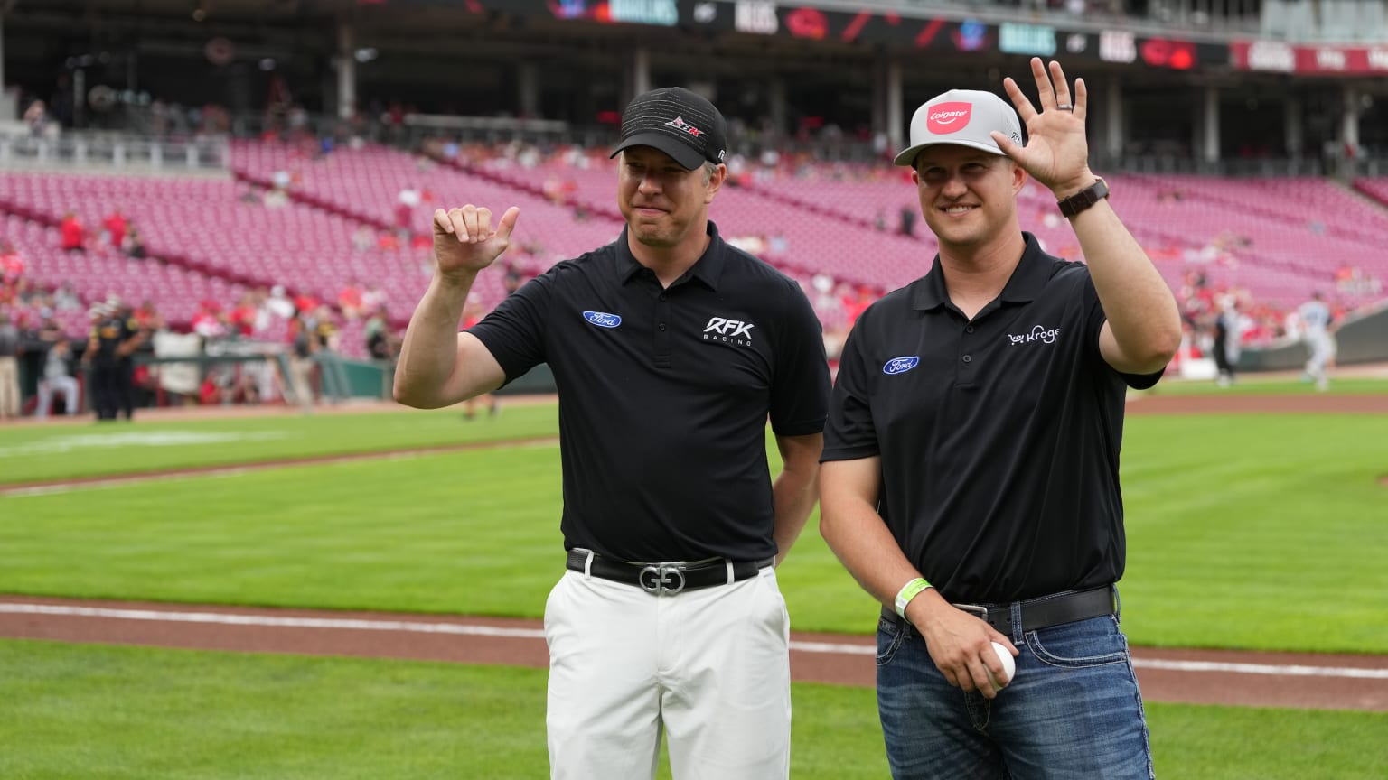 NASCAR drivers throw out first pitch at Reds game