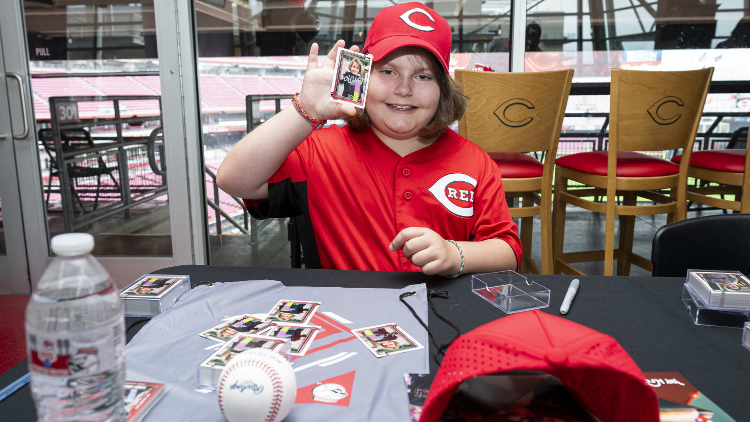 TJ Friedl, Reds give back with signings at children's hospital