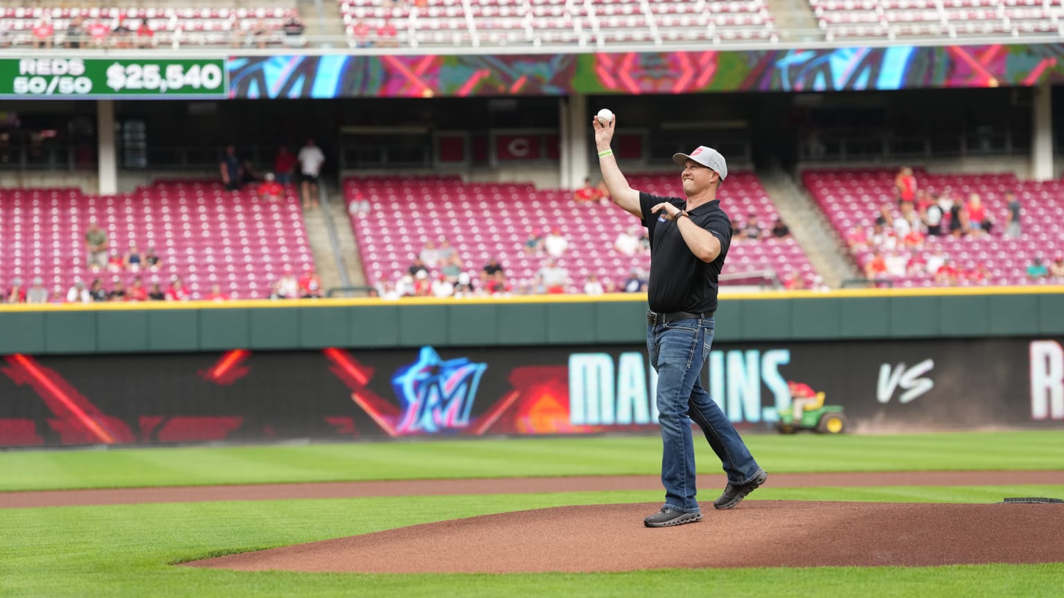NASCAR drivers throw out first pitch at Reds game
