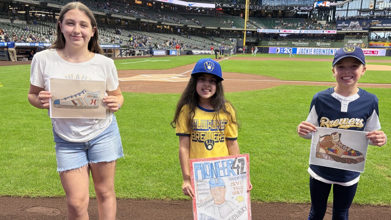 Brewers' Jackie Robinson Design Contest winner throws first pitch