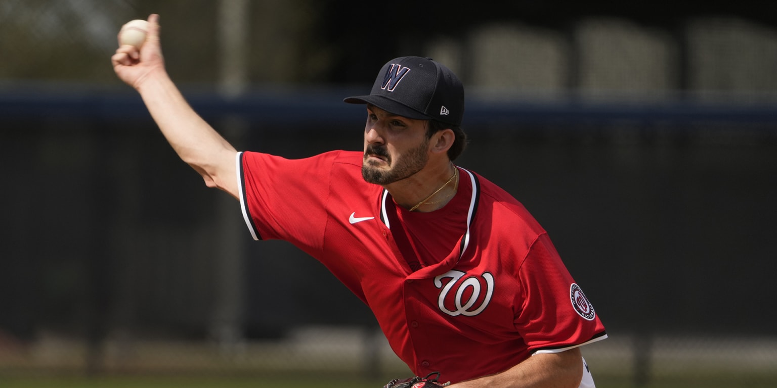 Cole Henry pitching as a reliever in Nationals' bullpen