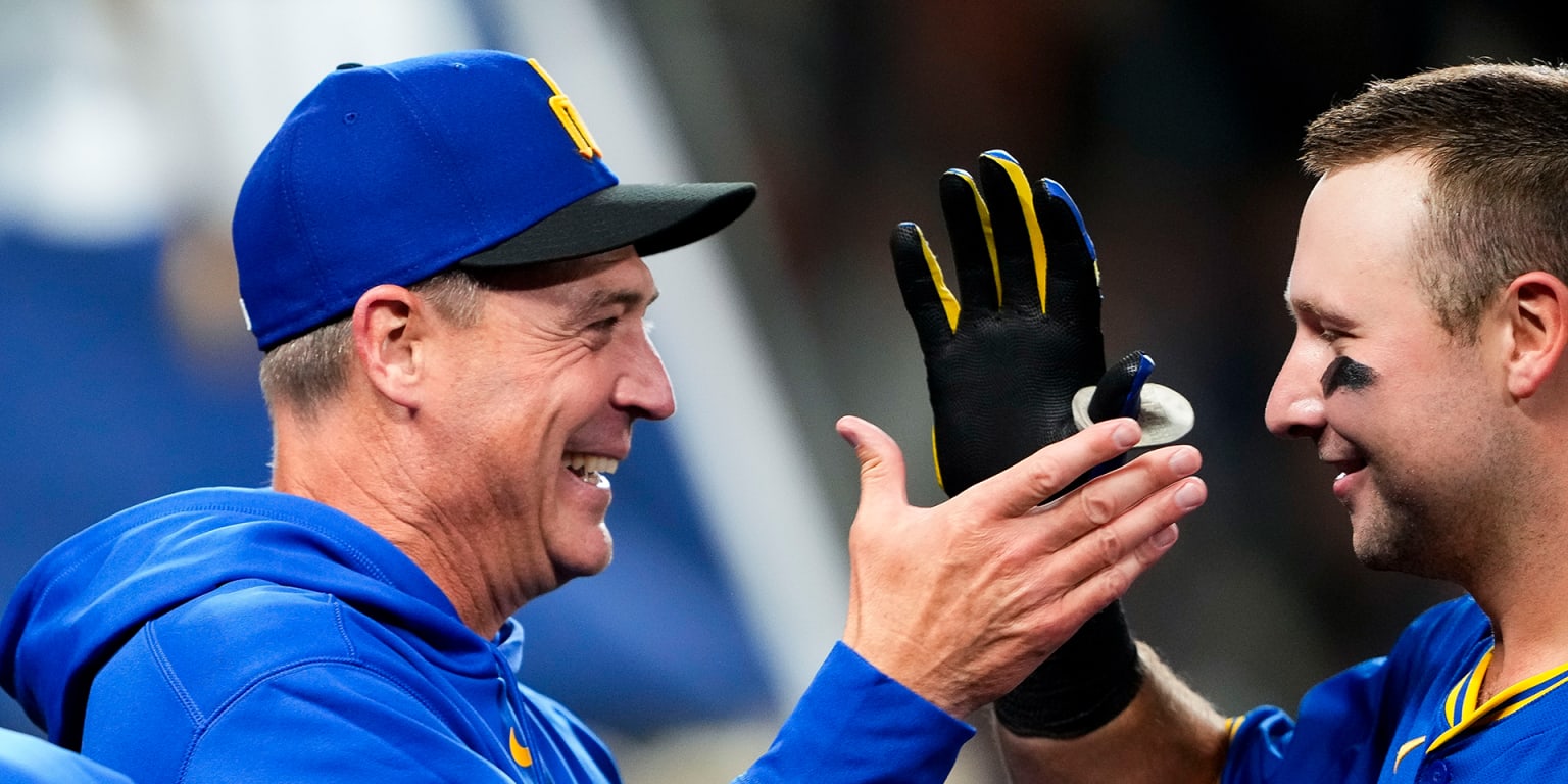 Cal Raleigh's special bond with Mariners' manager Dan Wilson