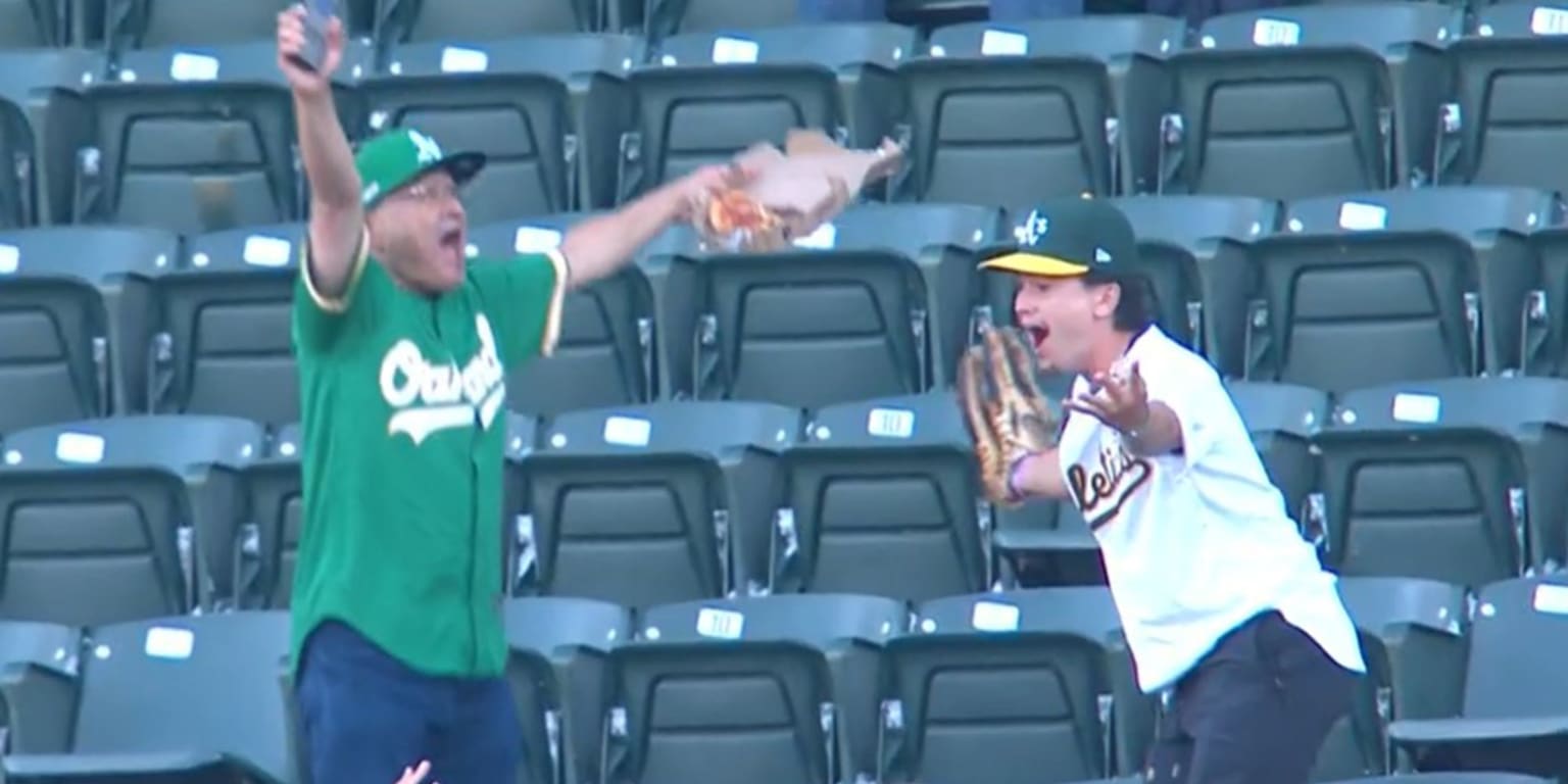 A's fan catches three foul balls in one inning