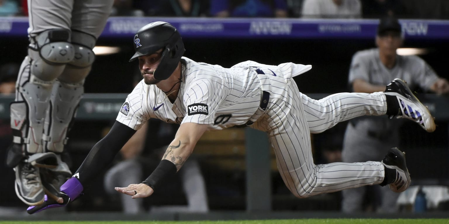 Rockies score six in eighth to beat Diamondbacks