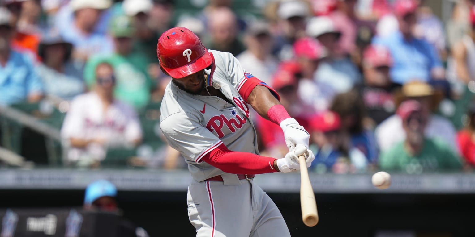 Trea Turner helps Johan Rojas make swing adjustments