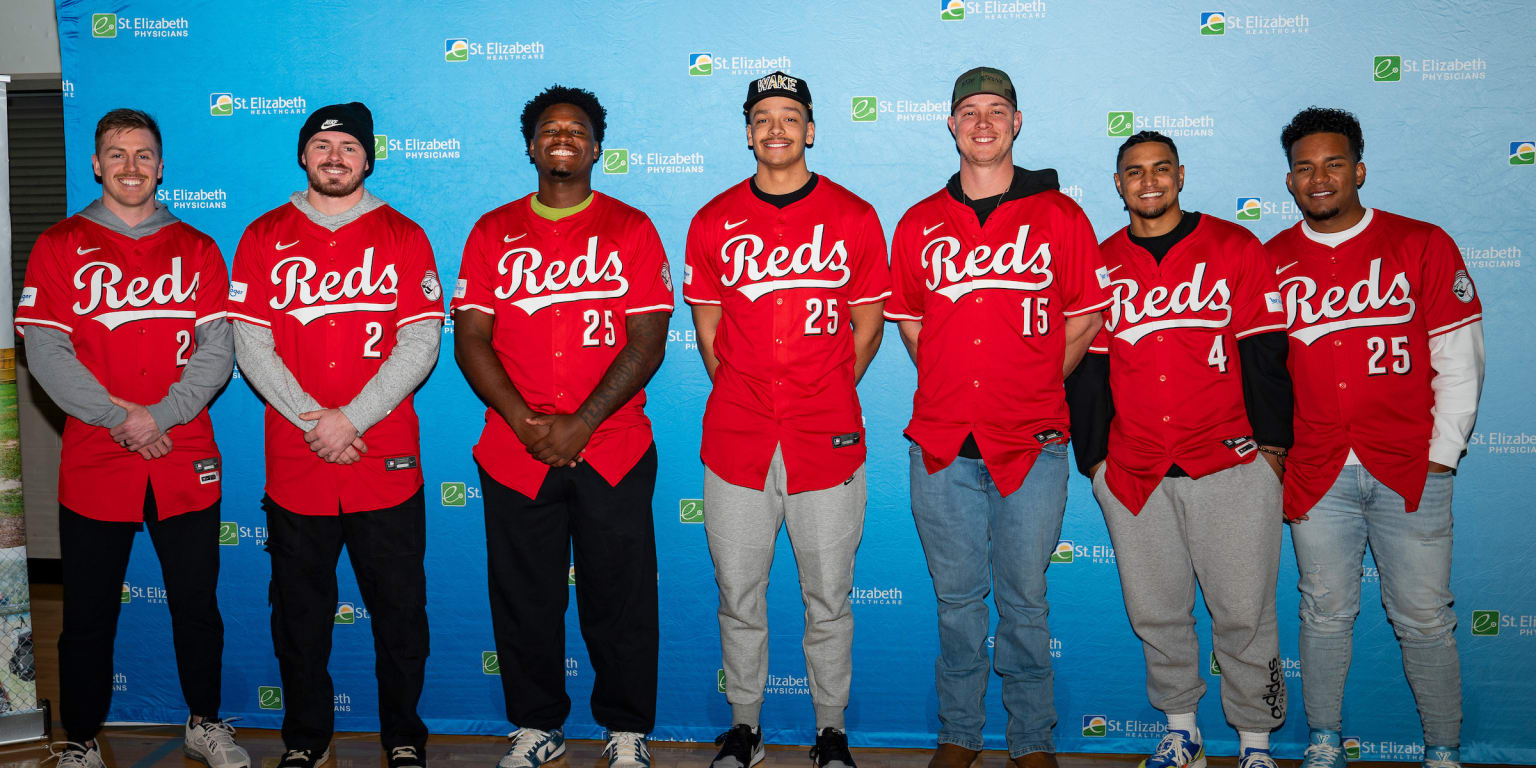 Reds Community Fund, players donate equipment to local high schools
