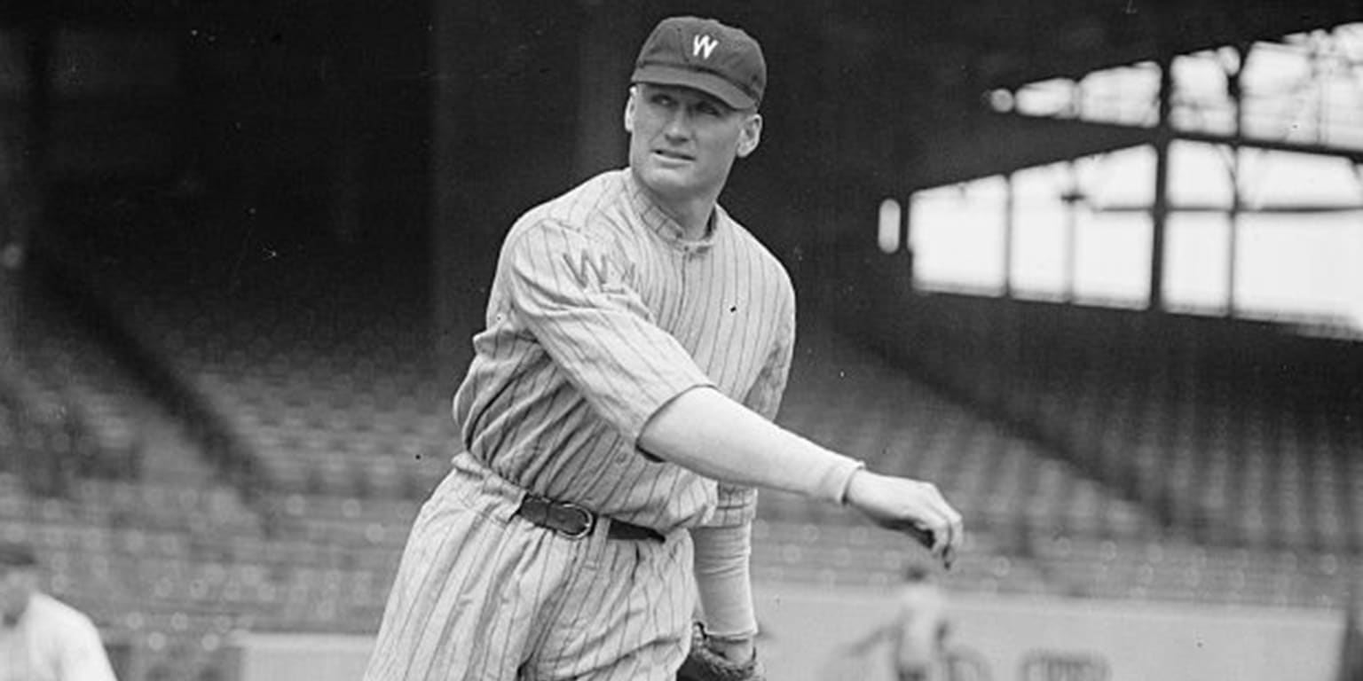 Walter Johnson throws silver dollar across river