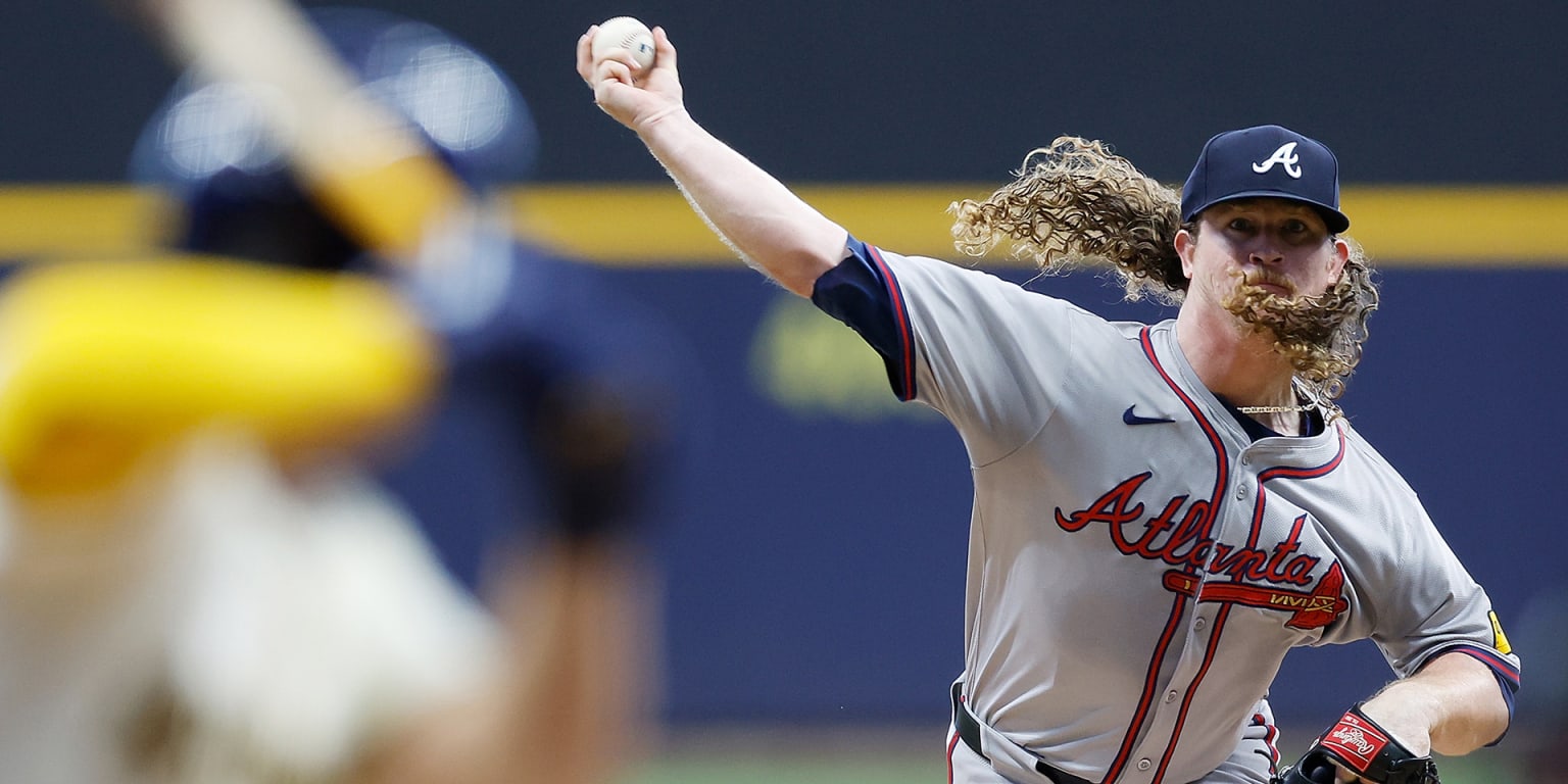 Grant Holmes strikes out eight in first MLB start