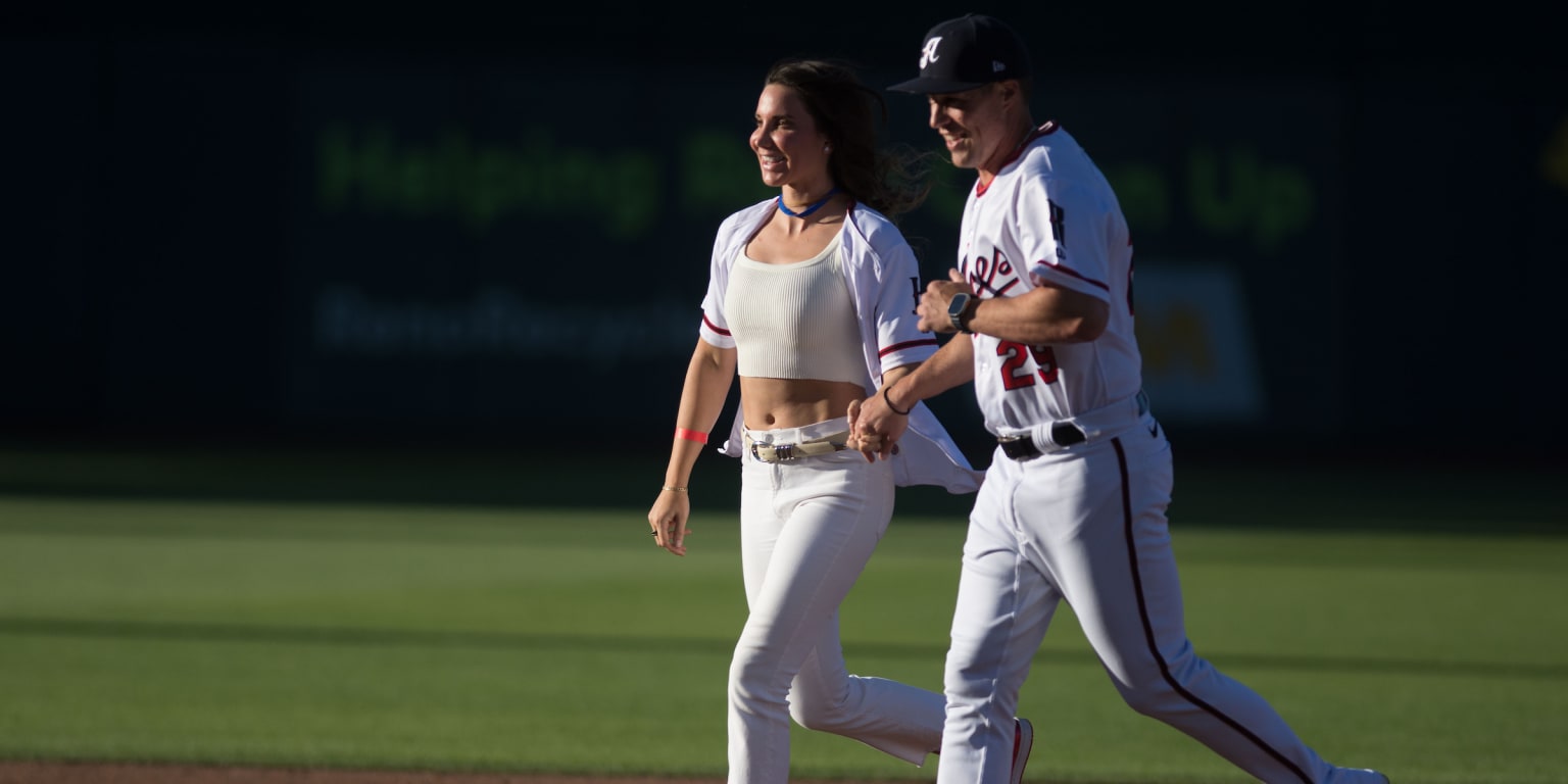 Reno Aces celebrate manager Blake Lalli during Home Run for Life game
