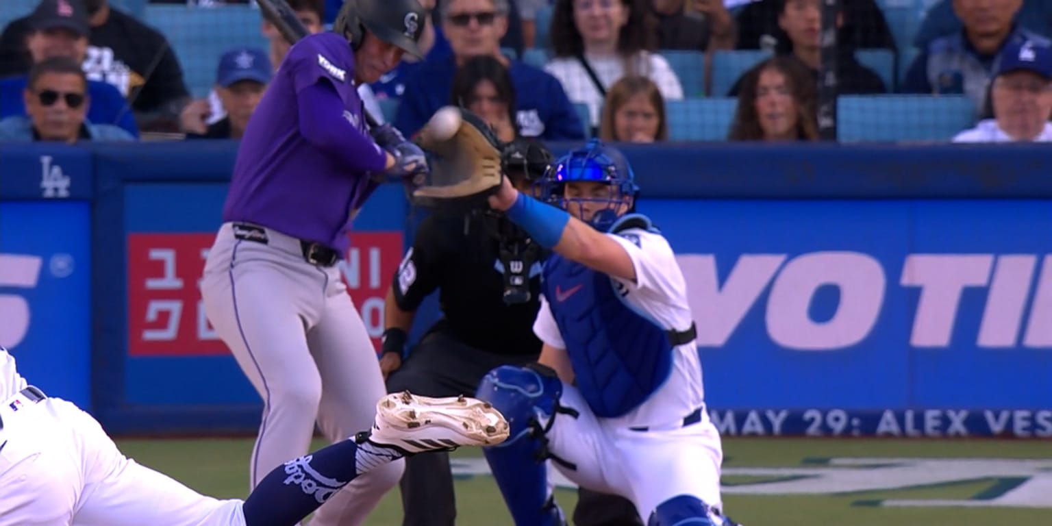 TJ Rumfield leaves Rockies game with right hand injury