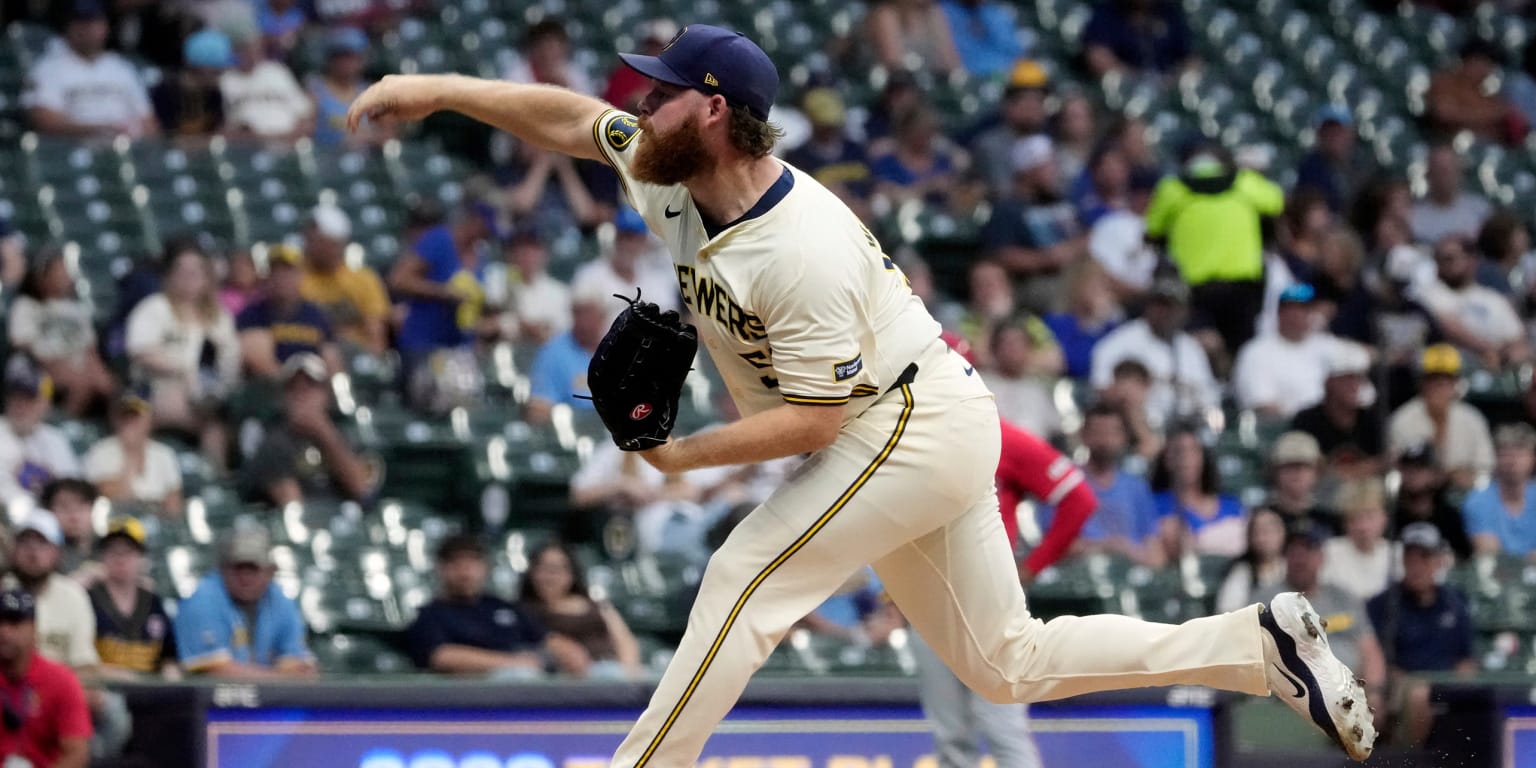 Brandon Woodruff strikes out nine in Brewers' win