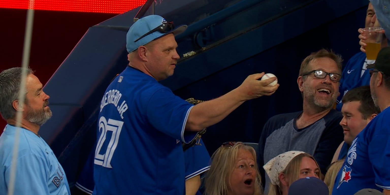Blue Jays fan catches two foul balls, gives one away