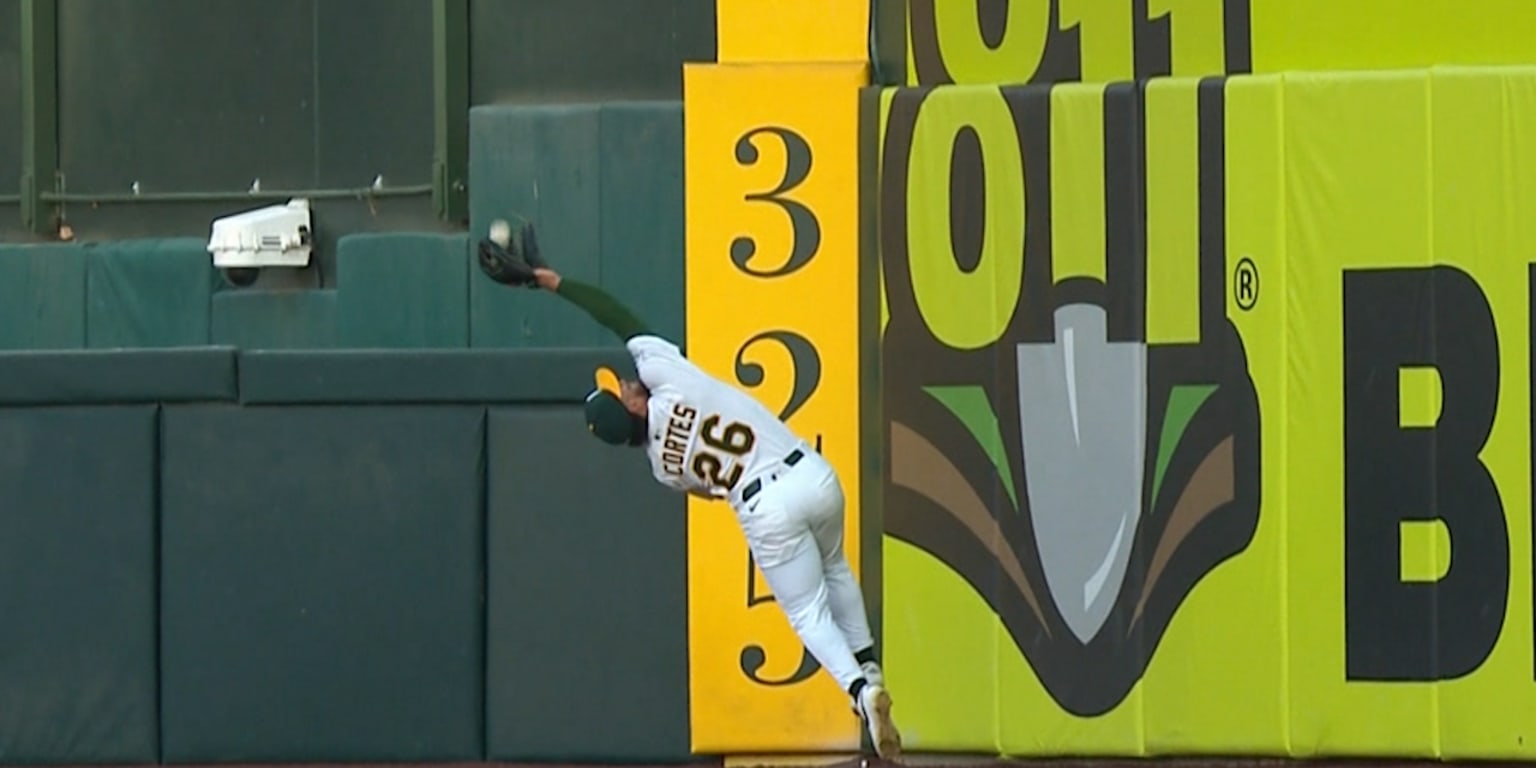 Carlos Cortes makes leaping catch, triples for Athletics