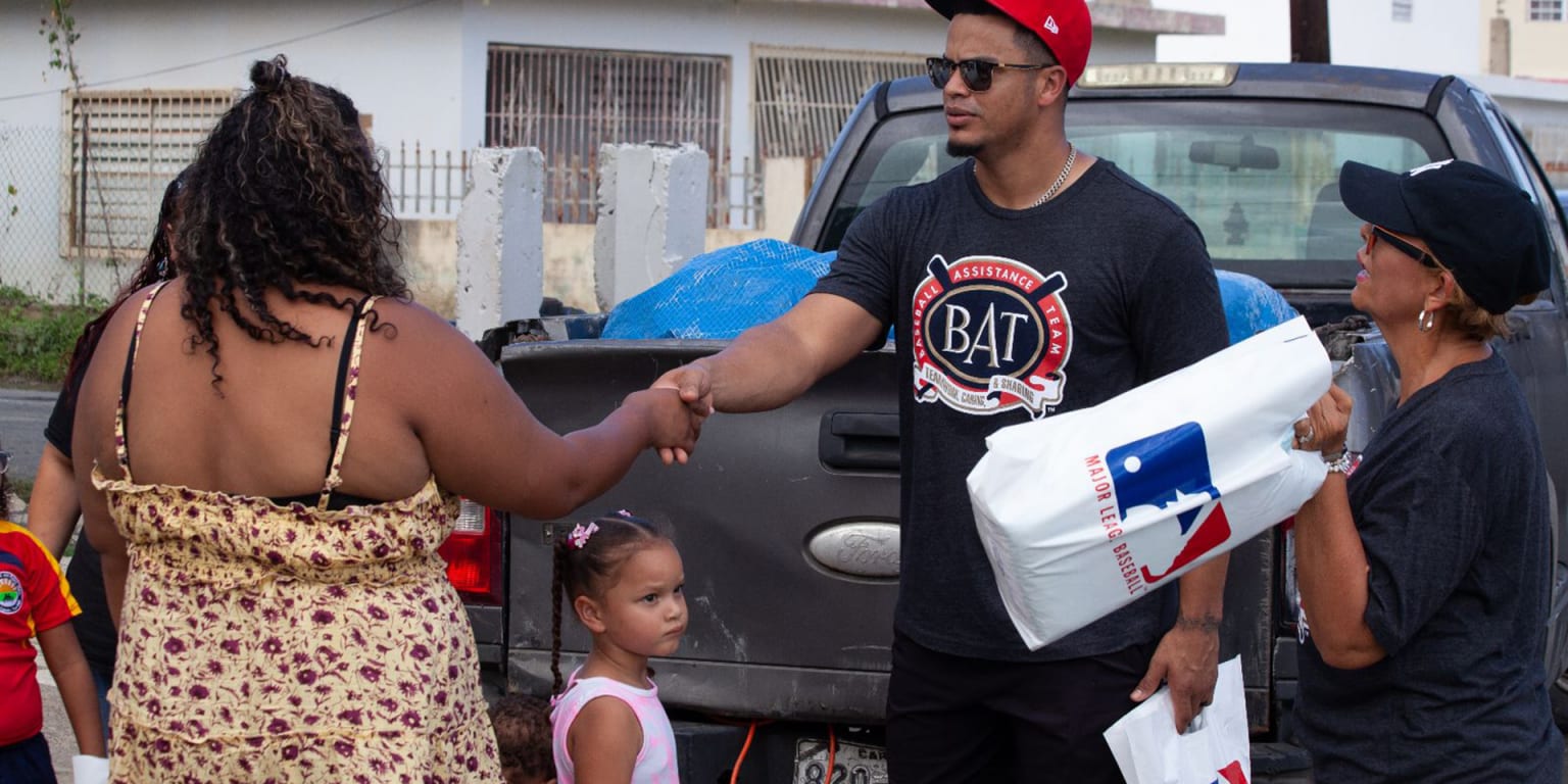 Fernando Cruz helped by Baseball Assistance Team after Hurricane Maria