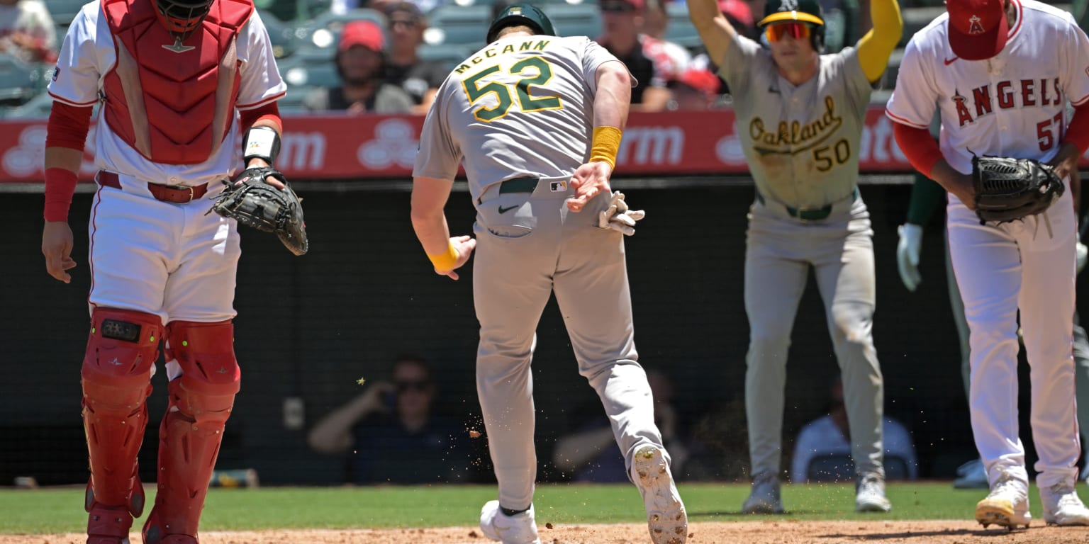 Kyle McCann misses home plate in wacky play against Angels