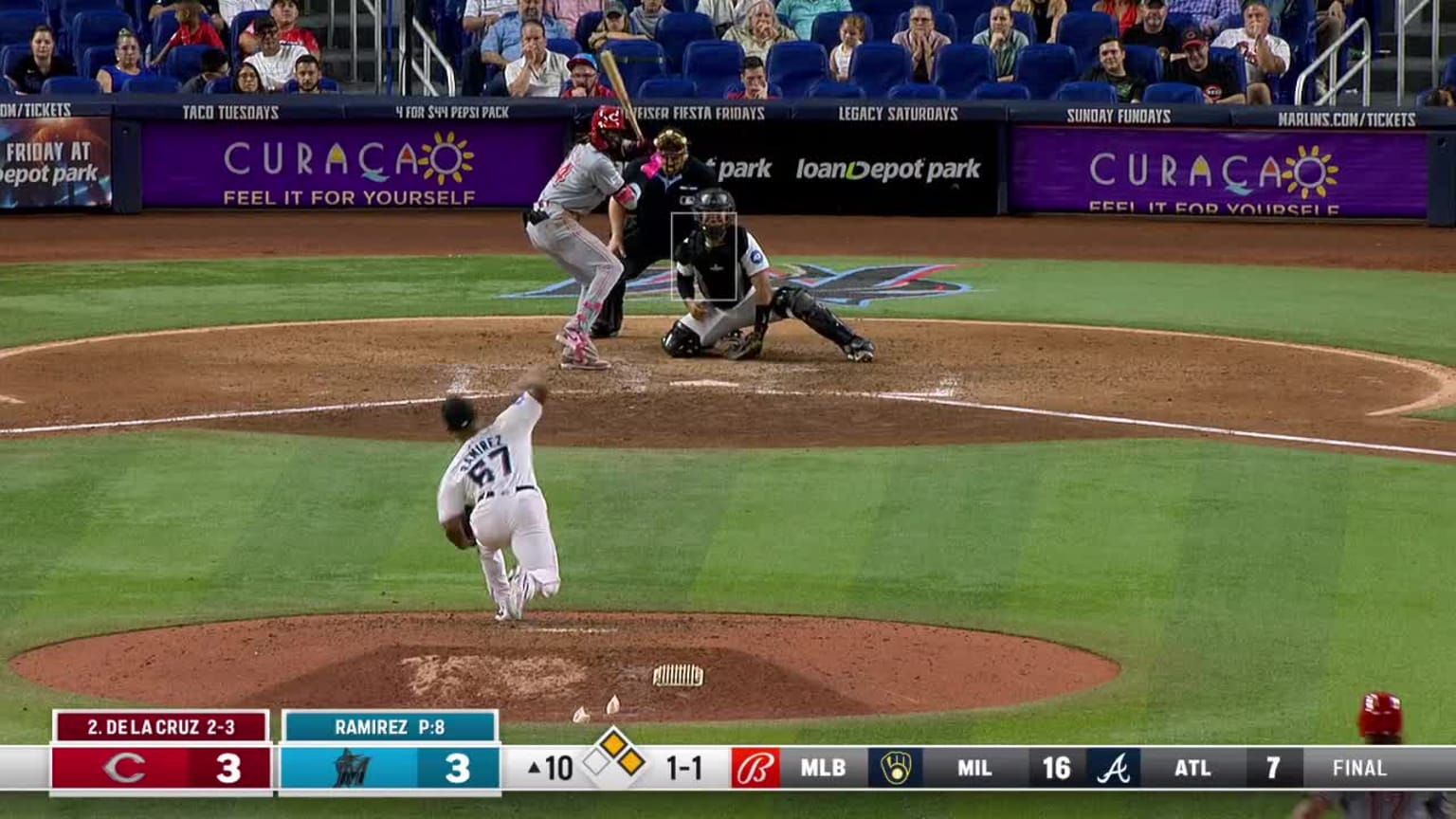 Elly De La Cruz singles on a line drive to second baseman Otto Lopez, deflected by first baseman ...