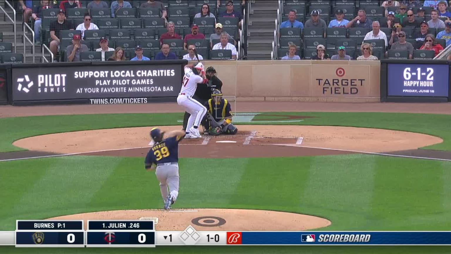 Edouard Julien singles on a line drive to left fielder Christian Yelich ...