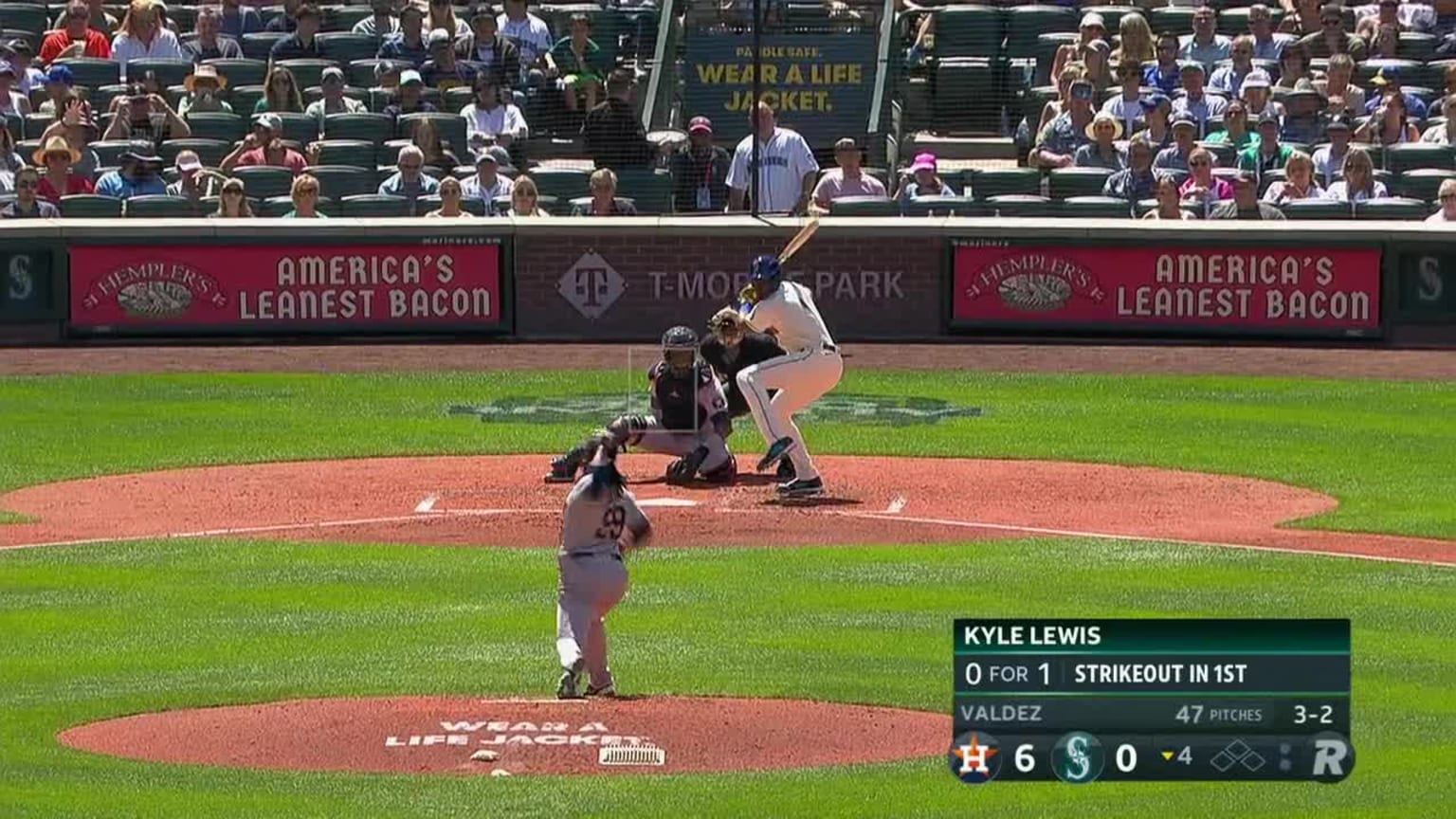 Kyle Lewis singles on a sharp line drive to center fielder Mauricio ...
