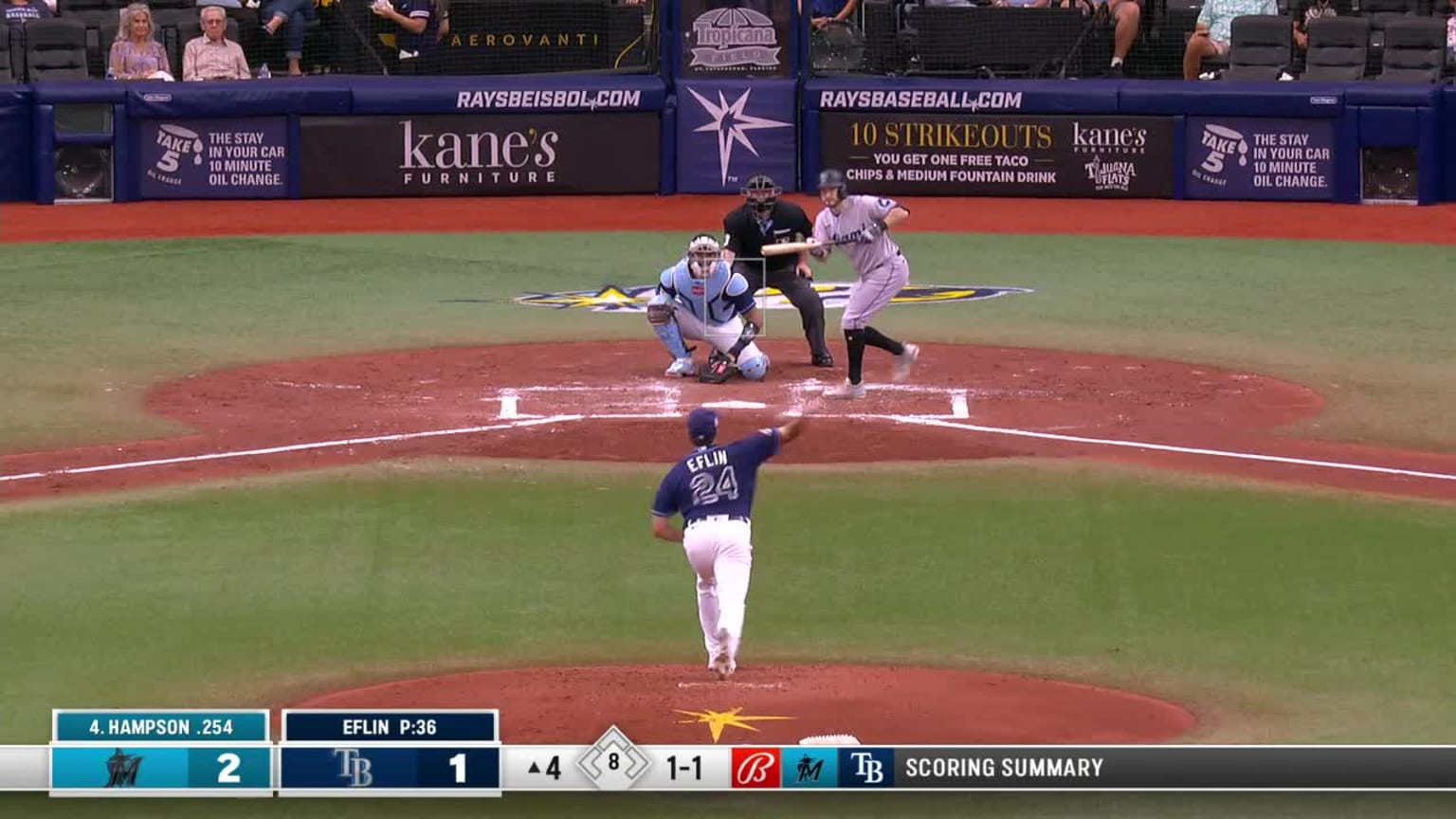 Garrett Hampson singles on a bunt ground ball to third baseman Isaac ...